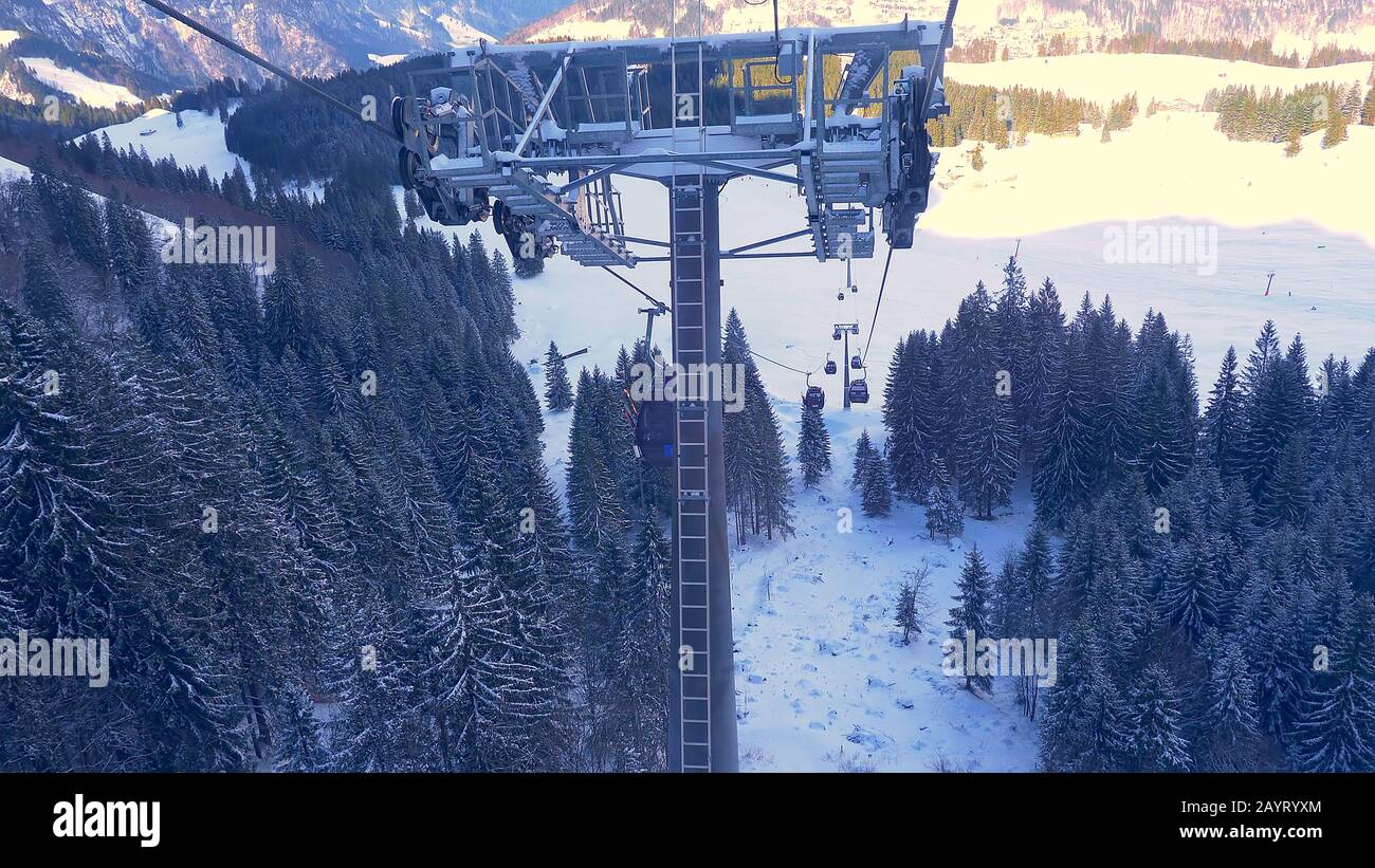 Ride in a cable car in the Alps on a winter's day Stock Photo - Alamy