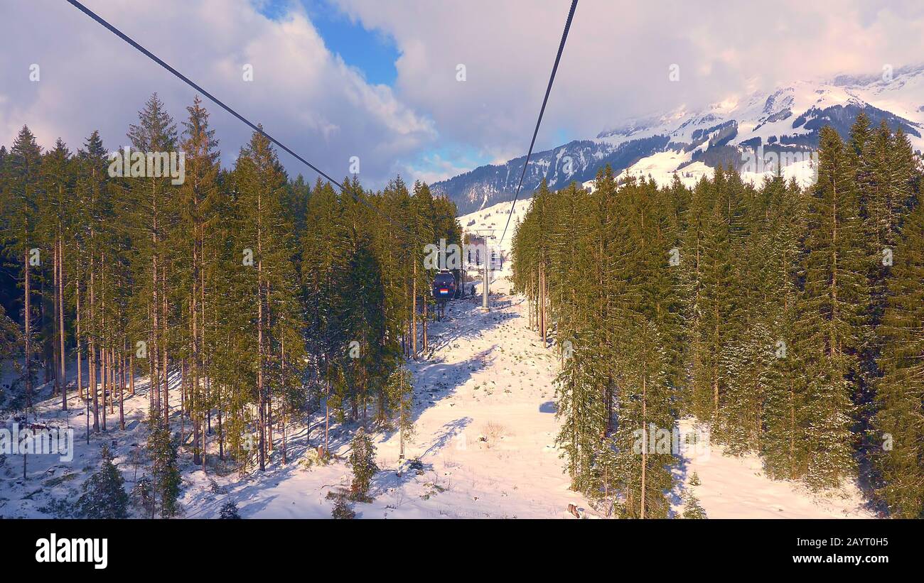 Ride in a cable car in the Alps on a winter's day - ENGELBERG, SWISS ...