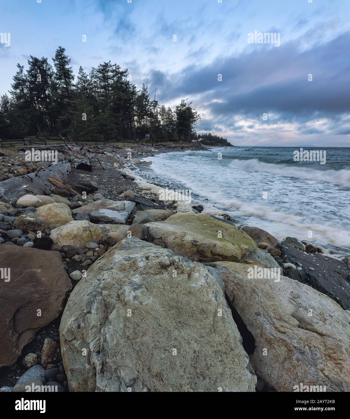 Windy morning with waves on rocky Kin Beach Provincial Park Stock Photo ...