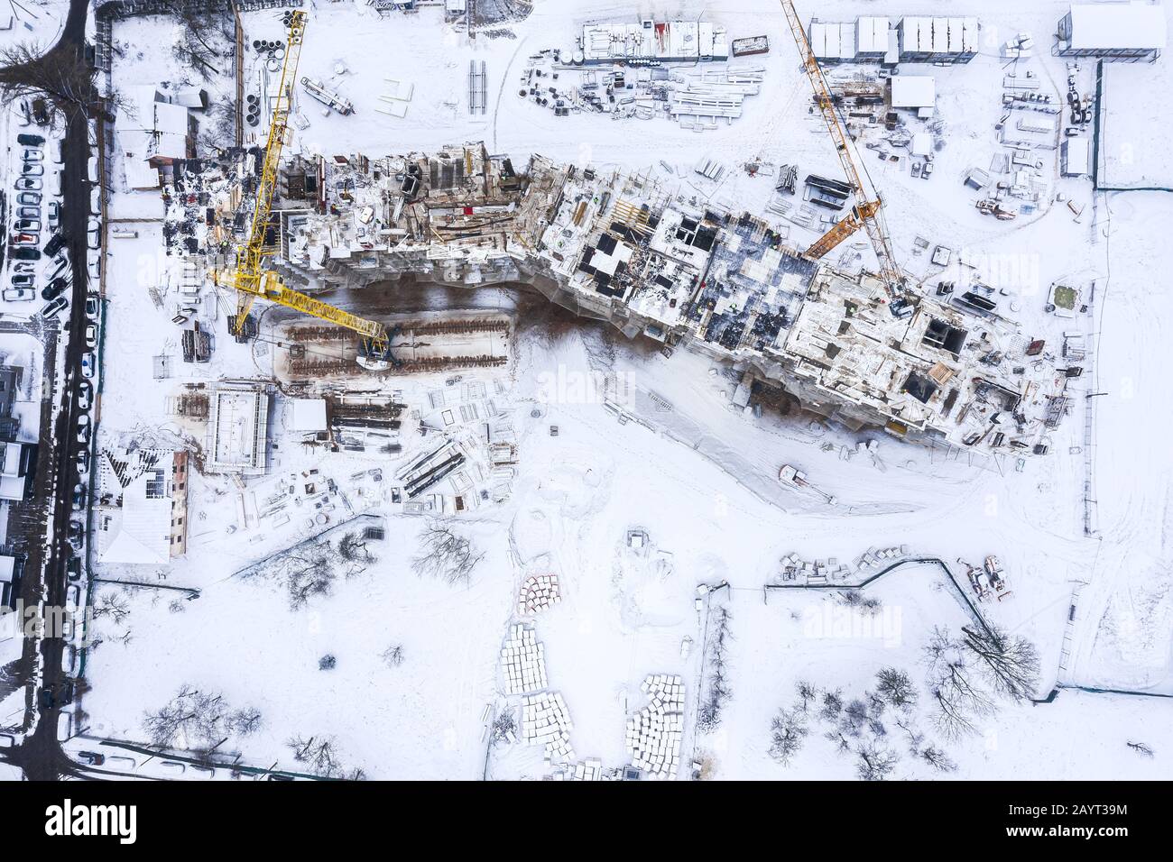 aerial top view of city construction site in winter. new apartment ...