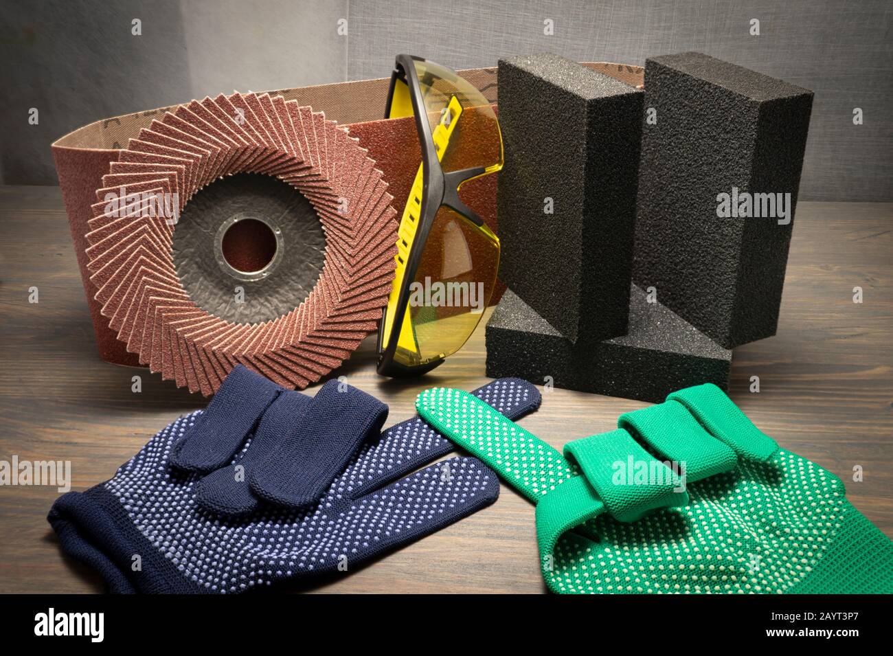 Various grinding tools - sanding belt, clamps, abrasive sponge and flap ...