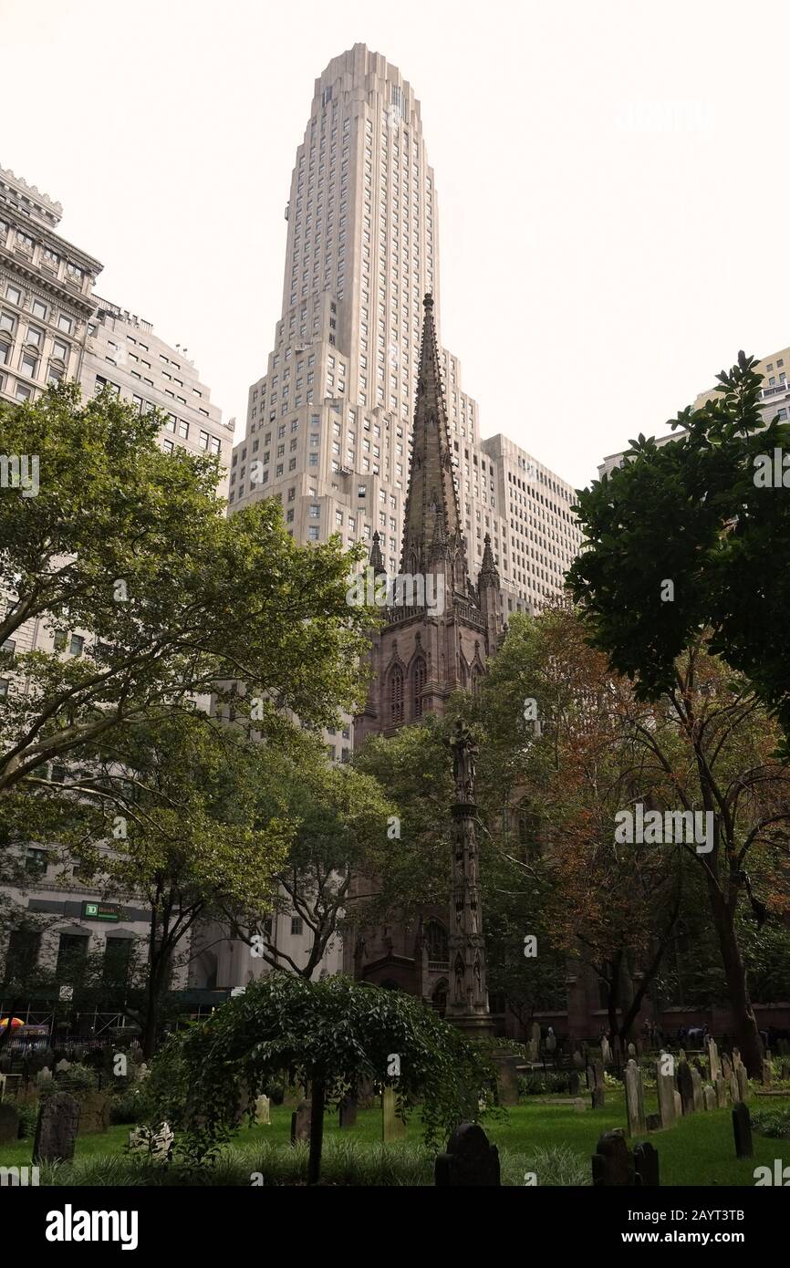 Art Deco monumental skyscraper One Wall Street and Trinity Church ...