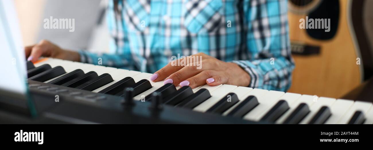 Woman giving music lesson hi-res stock photography and images - Alamy