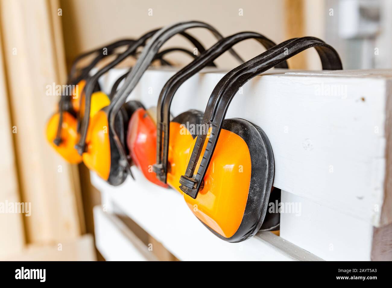 Safety protective headphones and glasses in carpentry, Construction ...