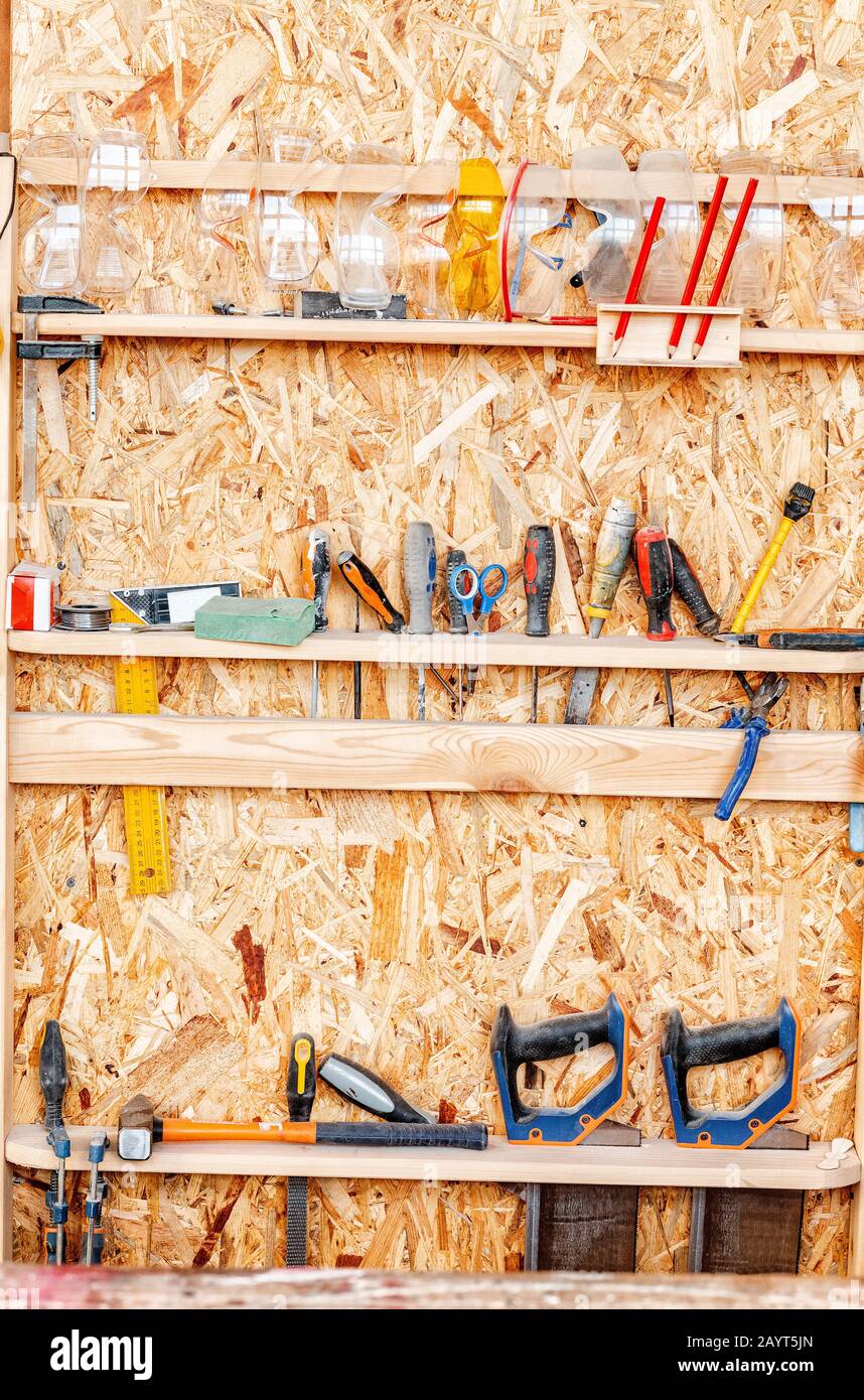 Set of vintage carpentry and joinery tools in workshop: craftsmanship ...