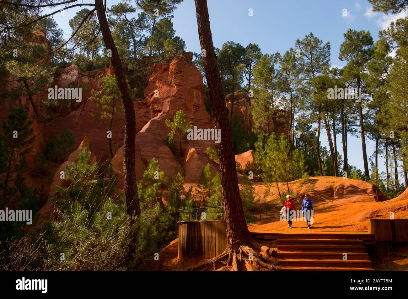 People visiting the Ochre rocks at the village of Roussillon in the ...