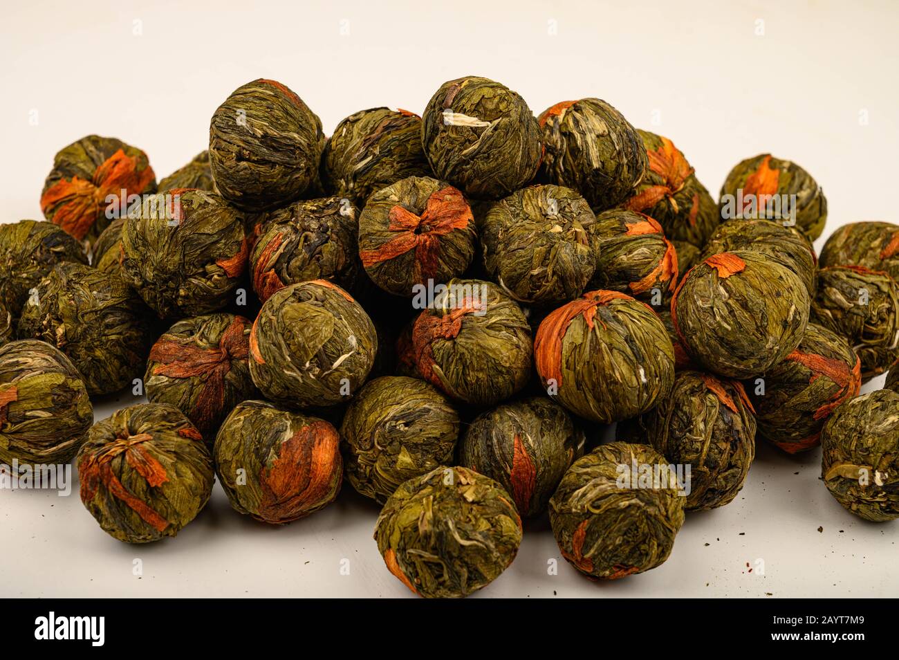 A ball of flower tea on a white background. Close up Stock Photo - Alamy