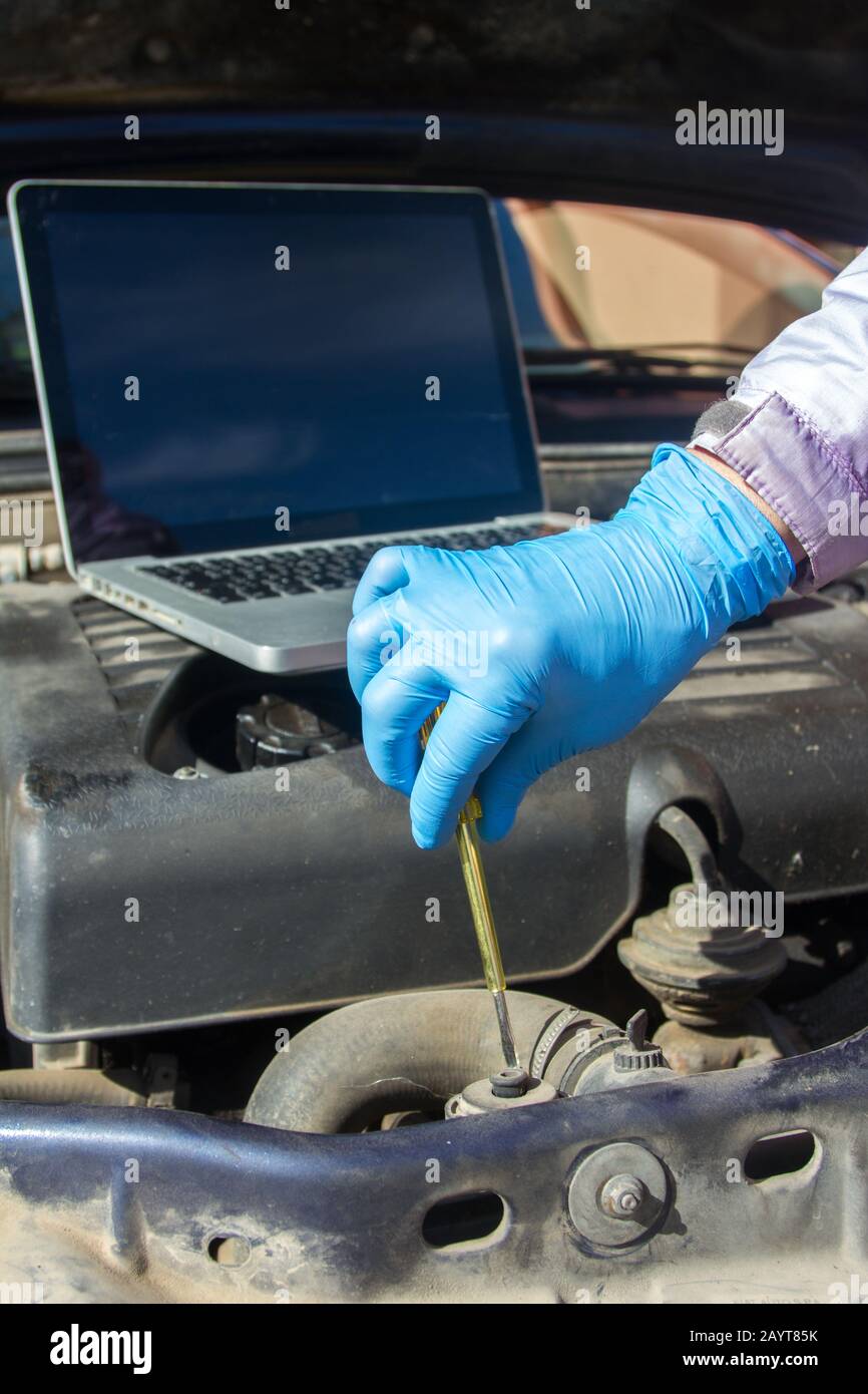 Checking cars engine hi-res stock photography and images - Alamy