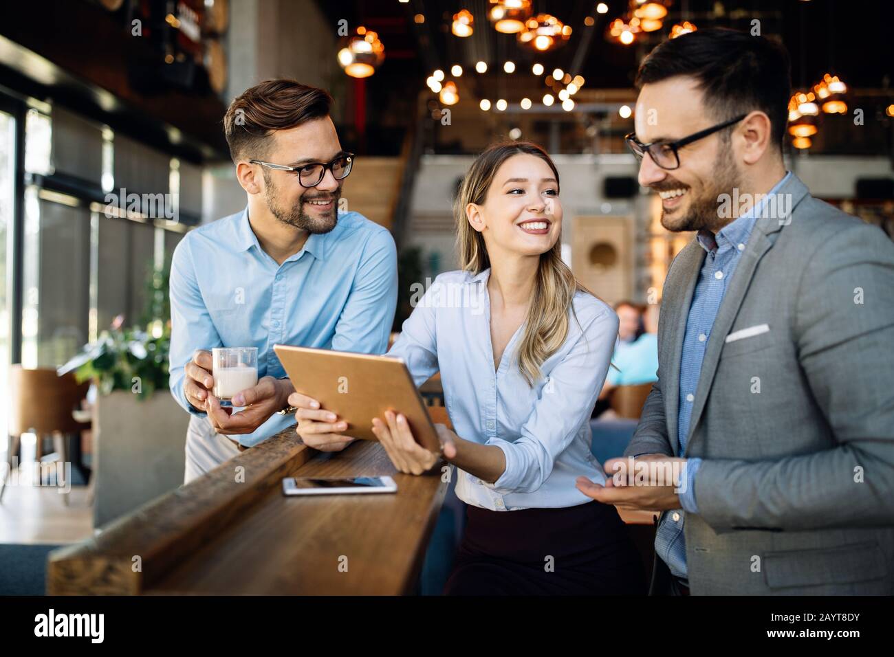 Business colleagues having conversation during coffee break Stock Photo ...