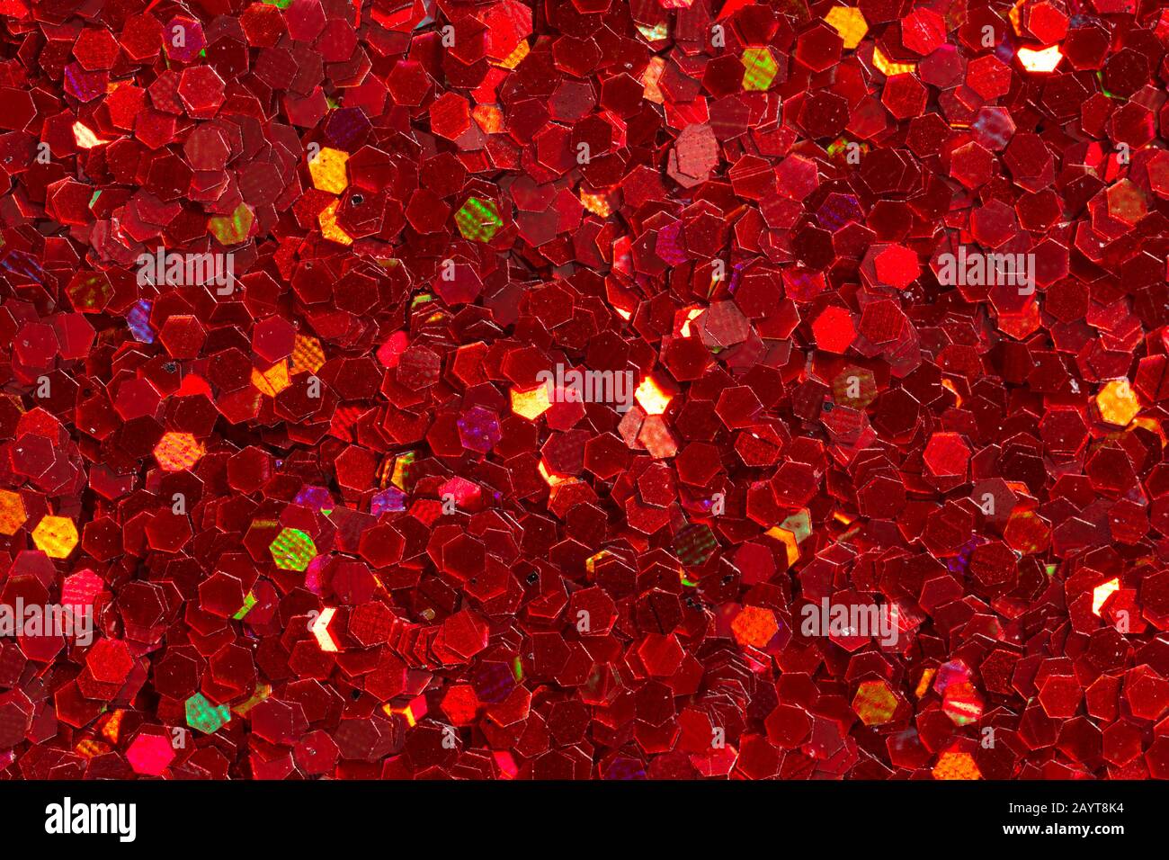 Carmine red figurines on glitter background. Background for creative ...