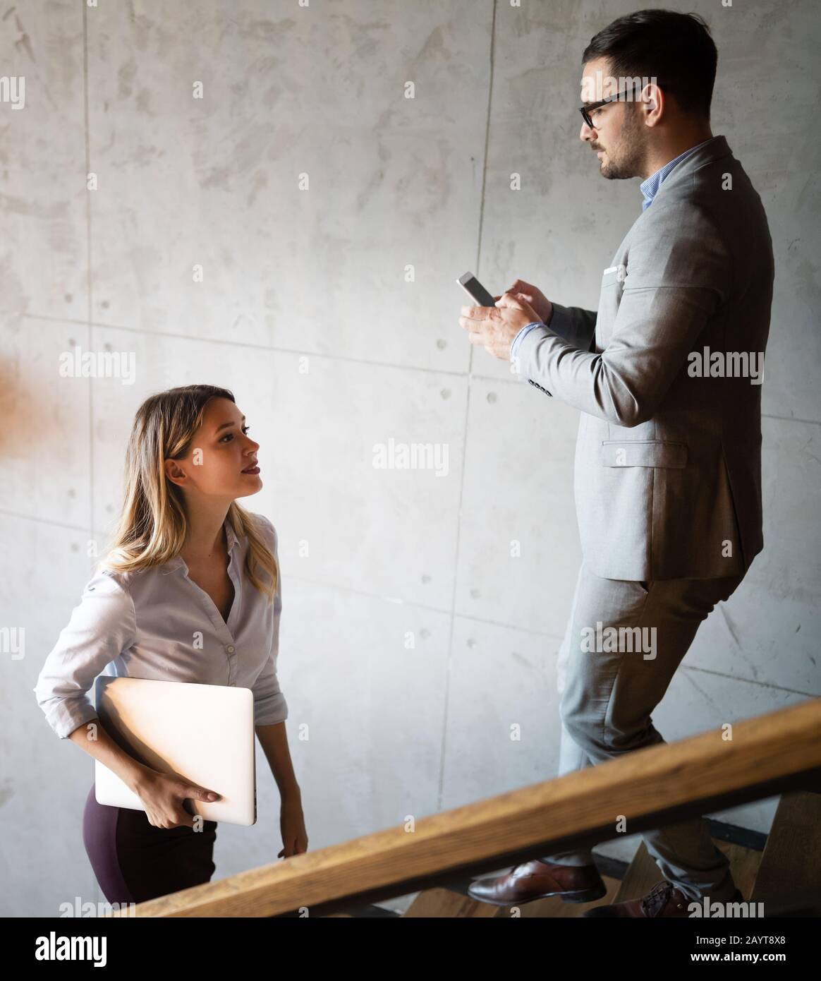 Businessman businesswoman busy staircase hi-res stock photography and ...