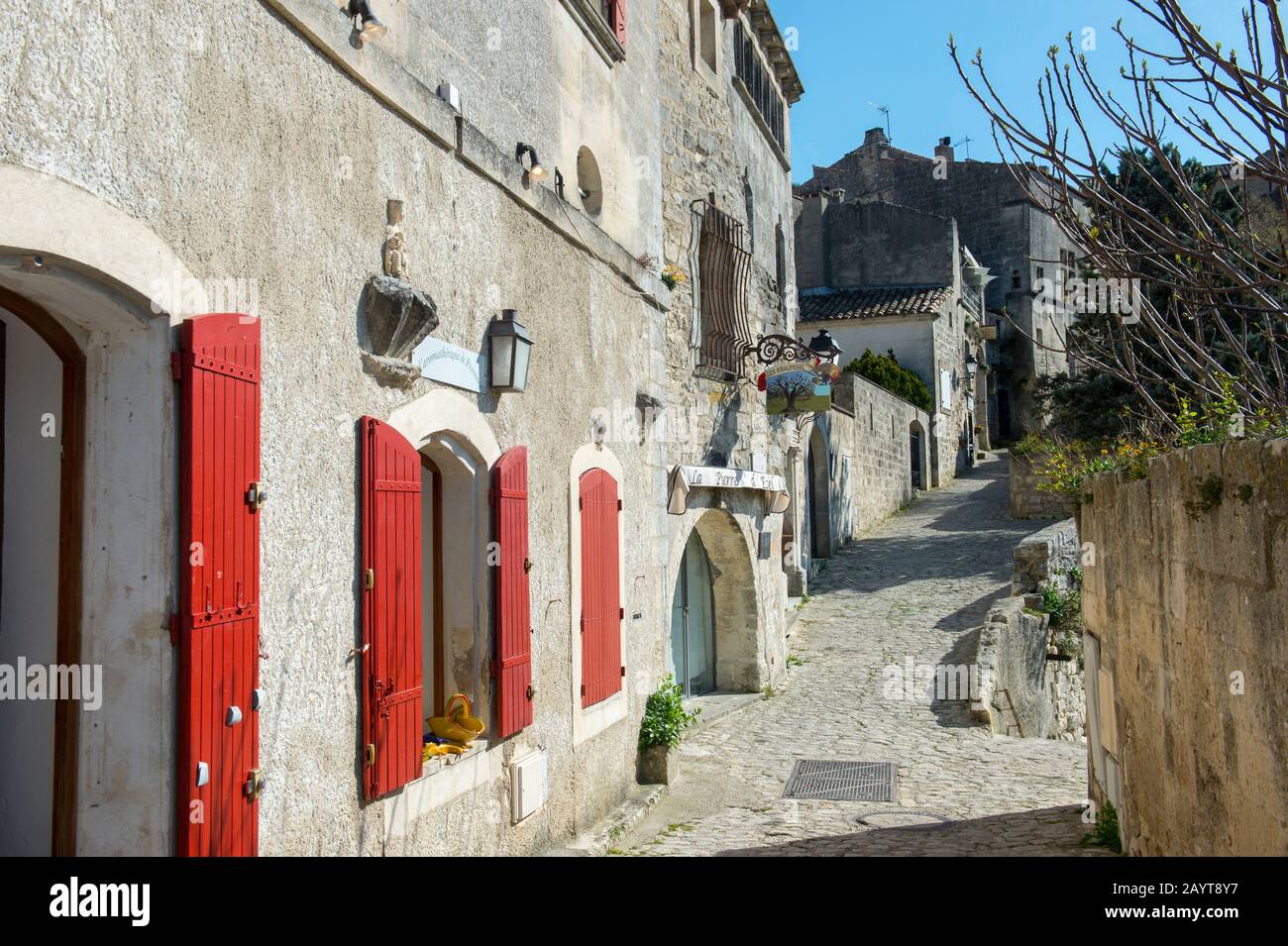 A street scene in Les Baux-de-Provence, a village in the Alpilles ...