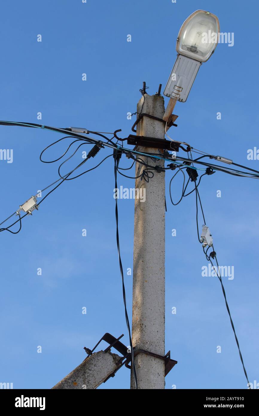 Electric pole with different wires and power equipment Stock Photo - Alamy