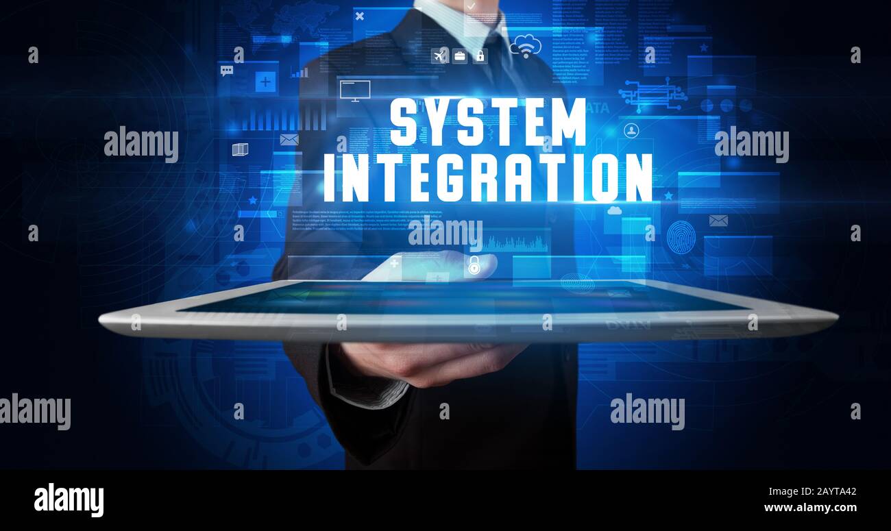 Young business person working on tablet and shows the digital sign ...