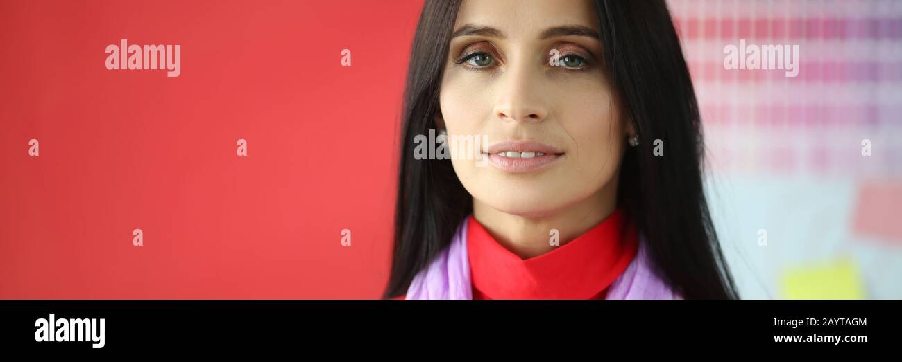 Pretty smiling female designer Stock Photo - Alamy