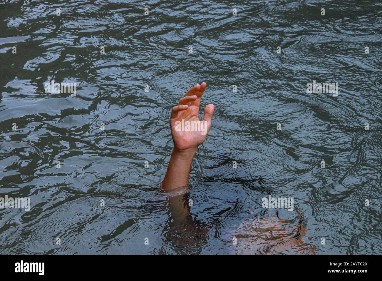 Hand Reaching Out Of Water 4,300+ Hand Reaching Out Of Water Stock