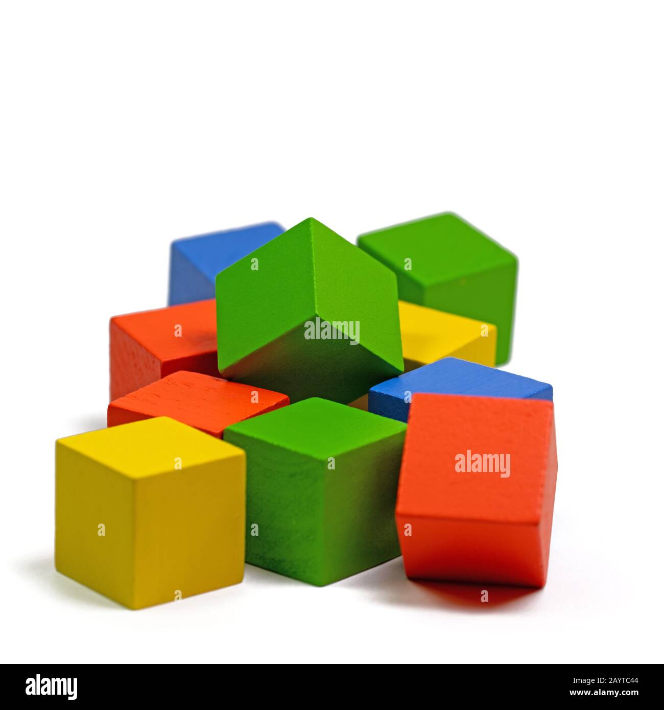 Colorful wooden toy blocks against white background Stock Photo - Alamy