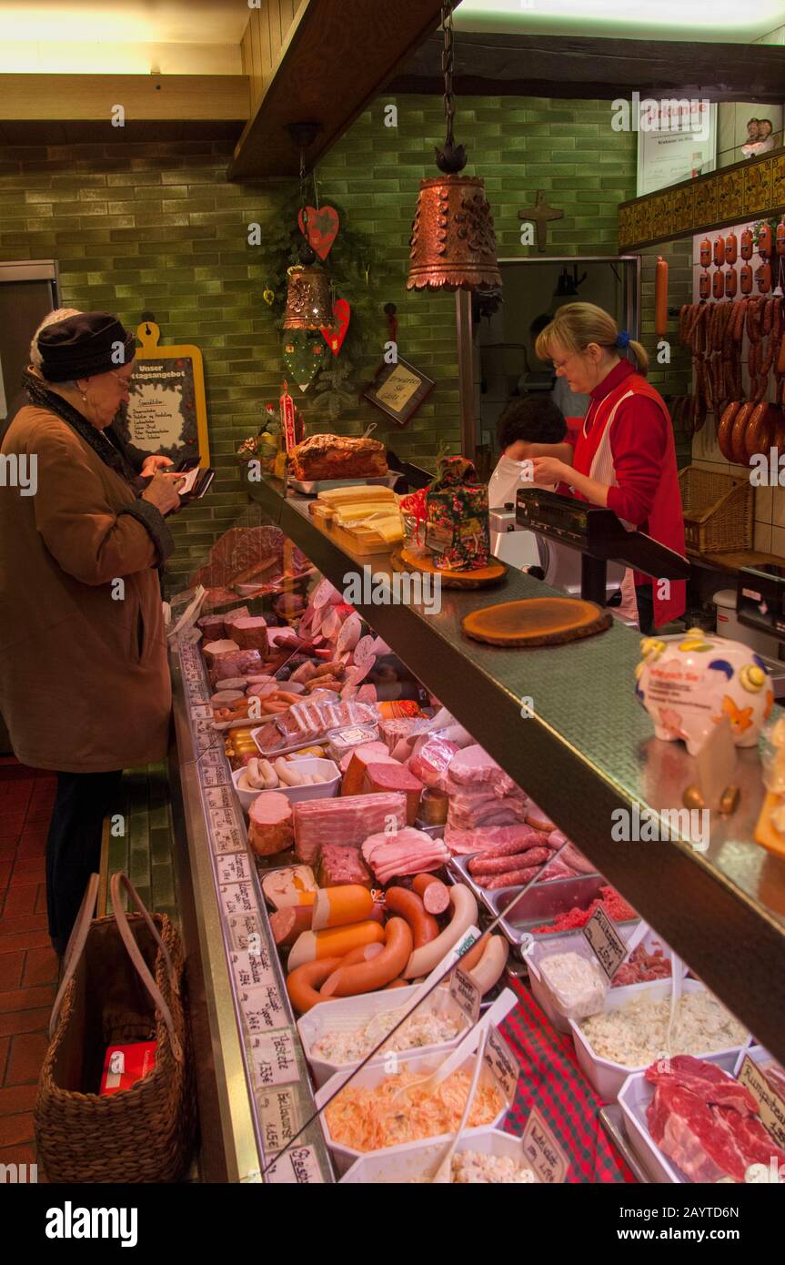 Woman butcher shop hi-res stock photography and images - Alamy