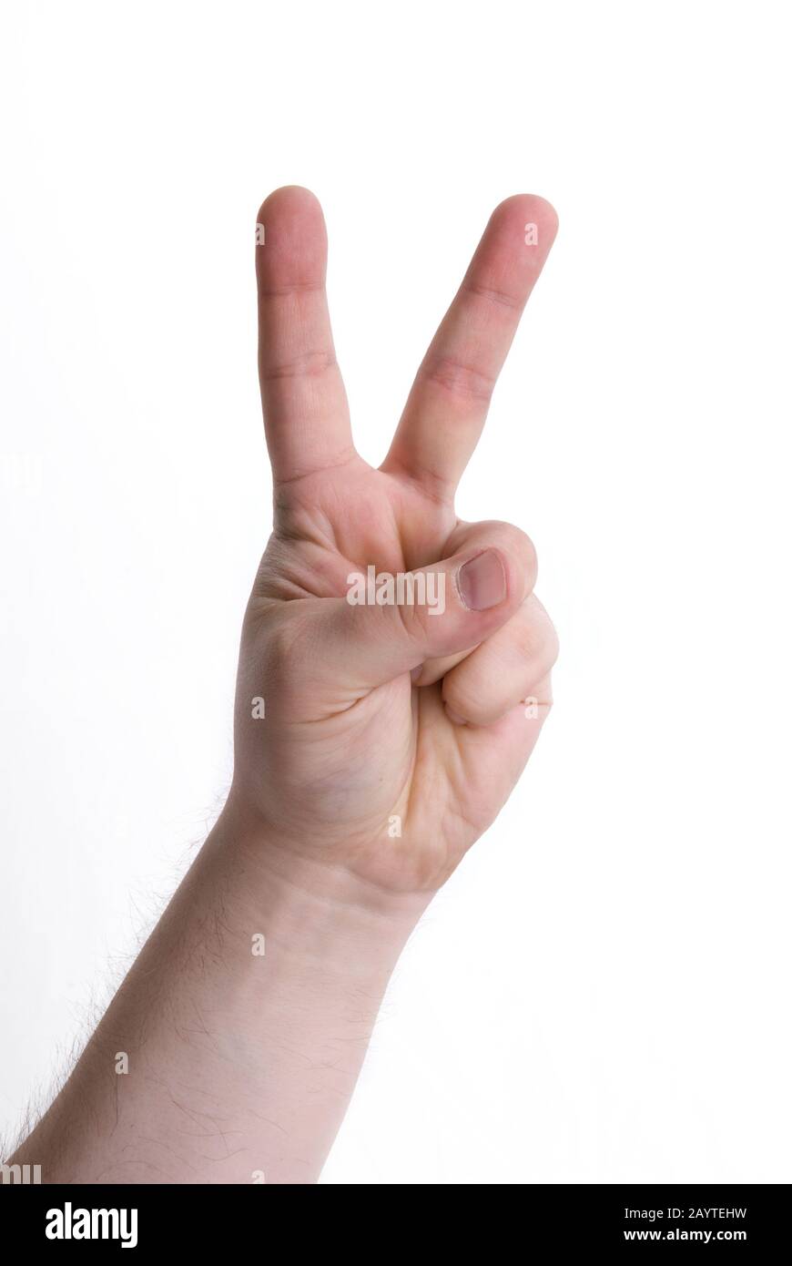 Victory sign with a male hand Stock Photo - Alamy