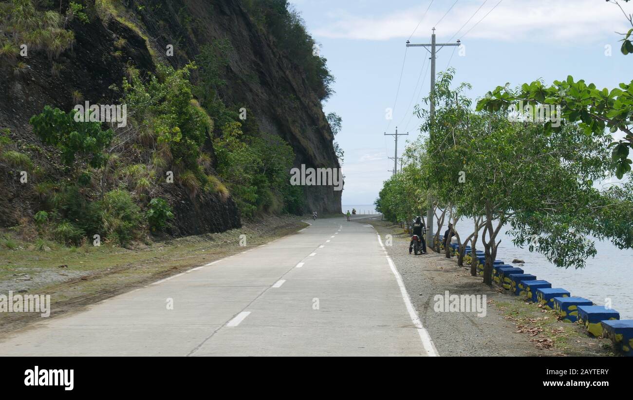 Governor Generoso, Davao Oriental, Philippines-March 2016: Paved road ...