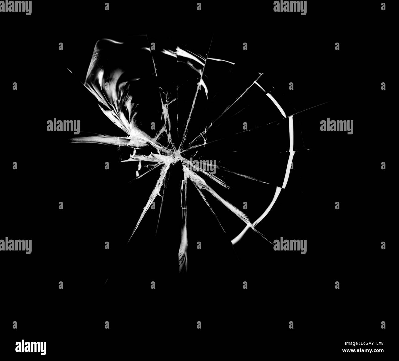 Cracks on broken glass from stone impact Abstraction of broken ...