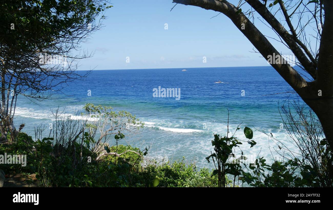 Scenic framed view of Parola Beach, Cape San Agustin, Davao Oriental ...
