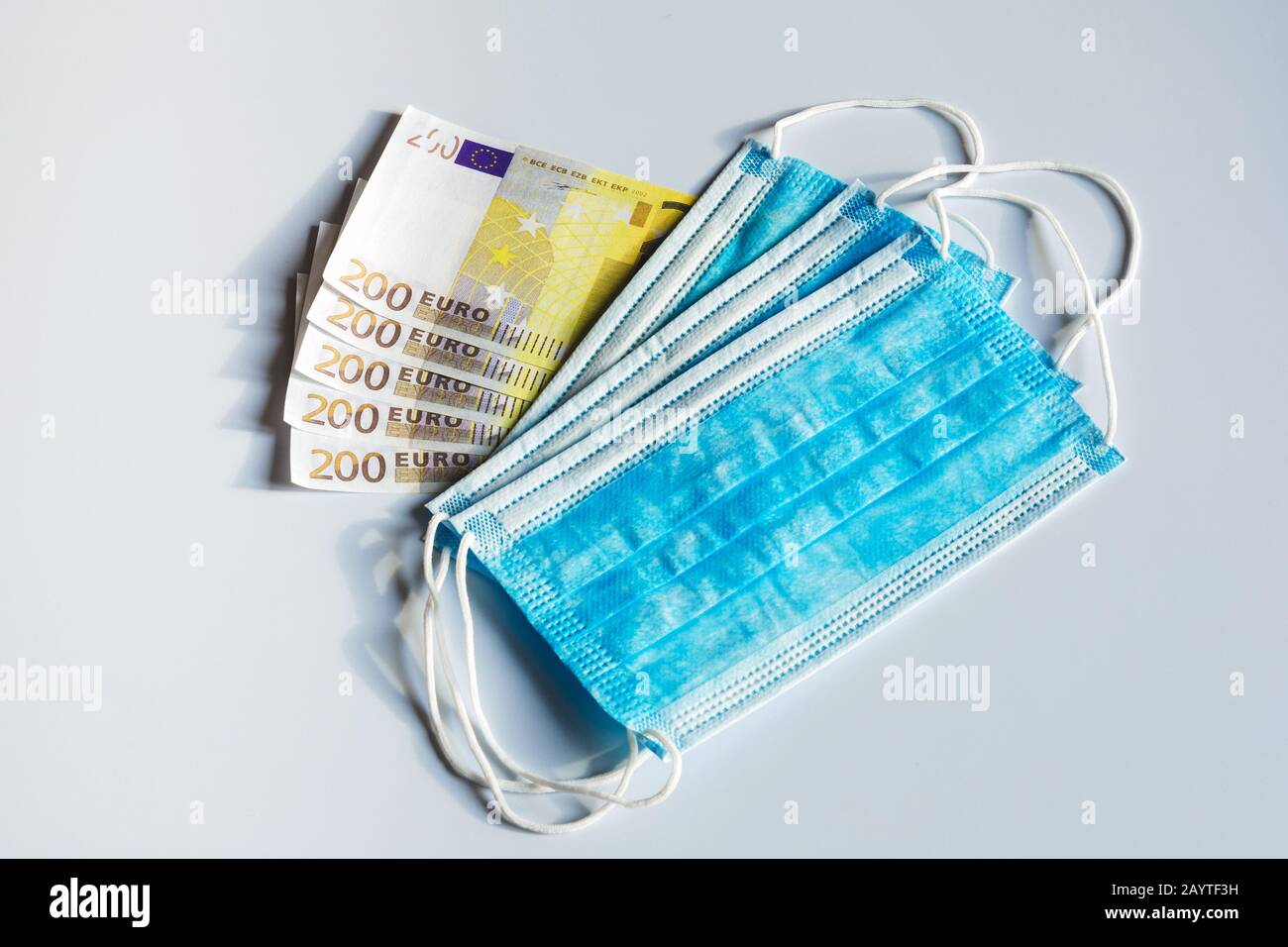 Medical masks and 200 Euro bills as a symbol of increased prices for ...