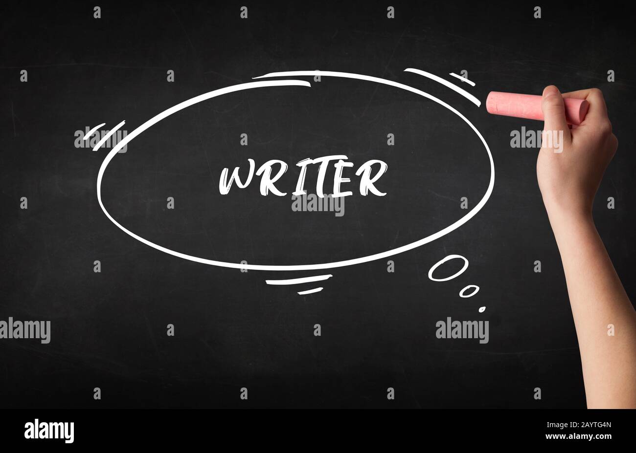 Hand drawing WRITER inscription with white chalk on blackboard ...