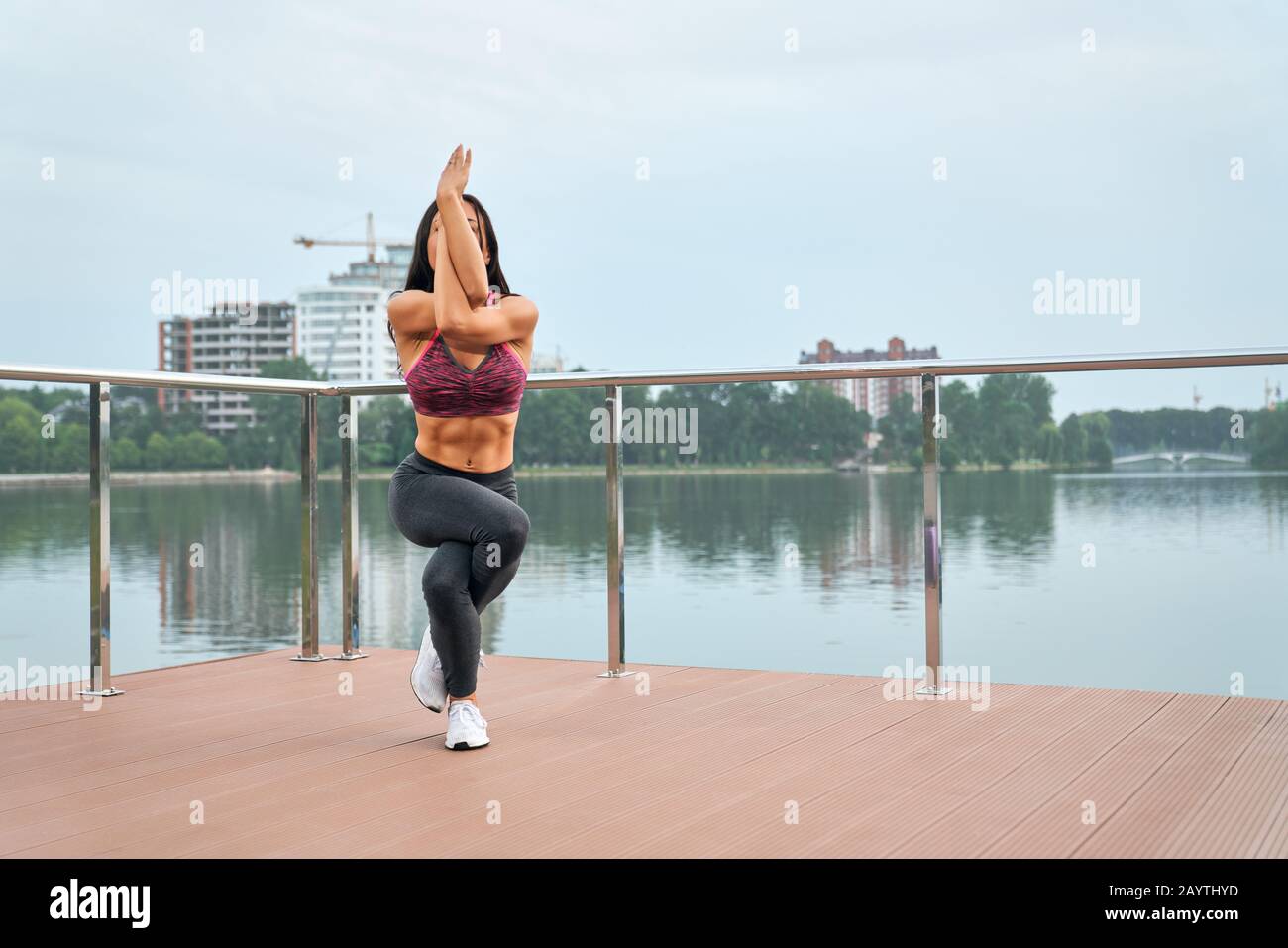 Yoga Standing Twist High Resolution Stock Photography and Images - Alamy