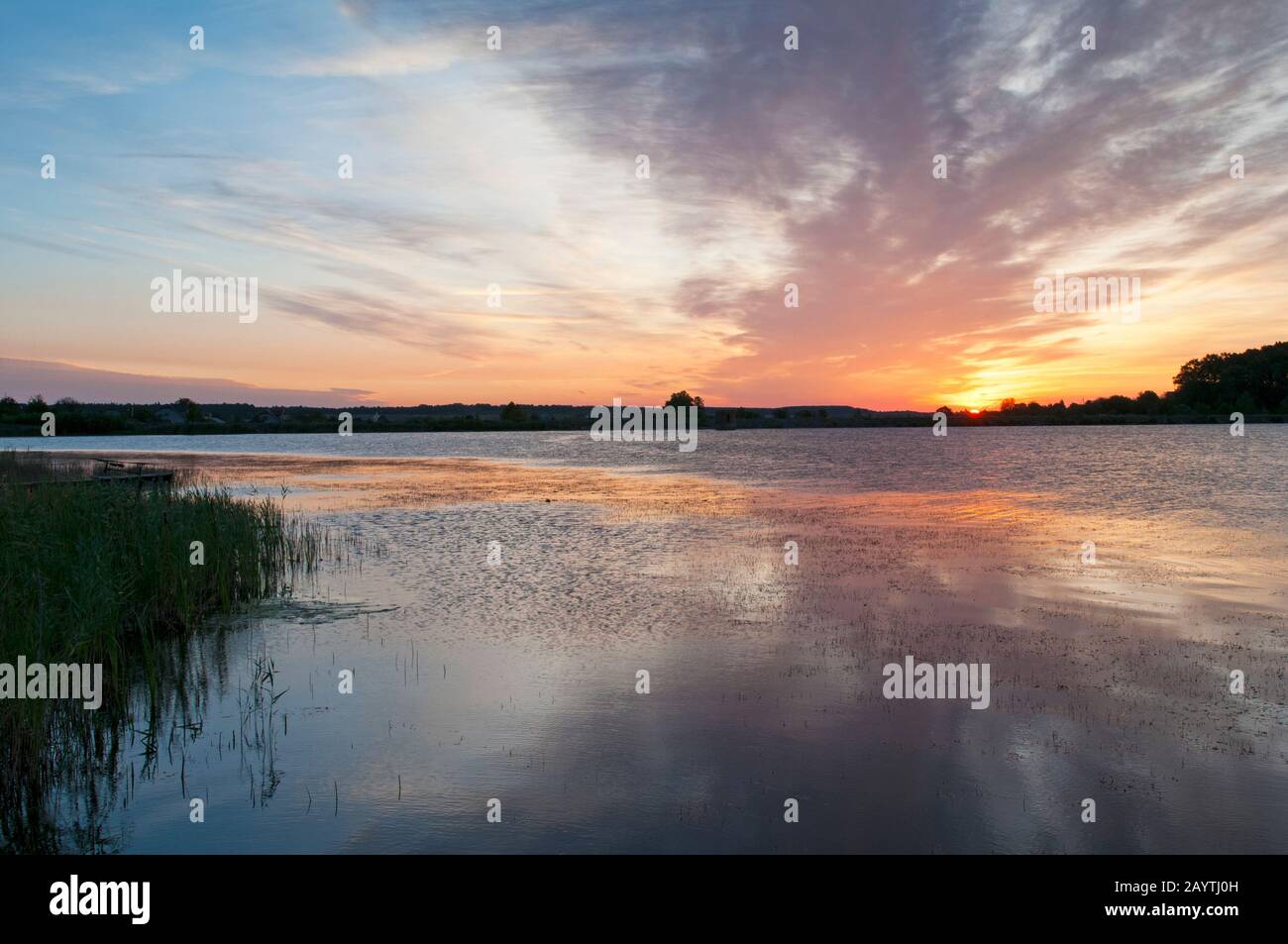 beautiful sunrise on the autumn lake Stock Photo - Alamy