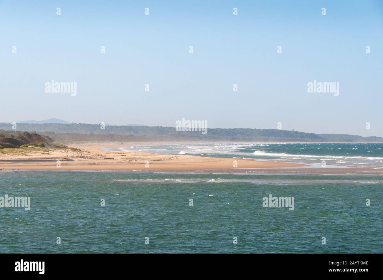 Summer beach landscape with sand coastline and mild waves. Summertime ...