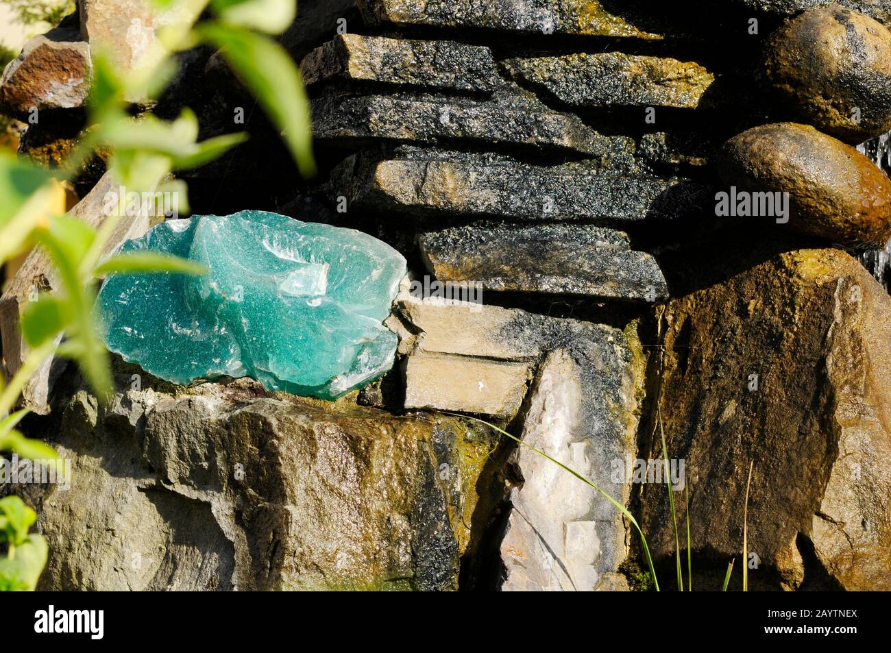 glass and natural stone in the open air Stock Photo - Alamy