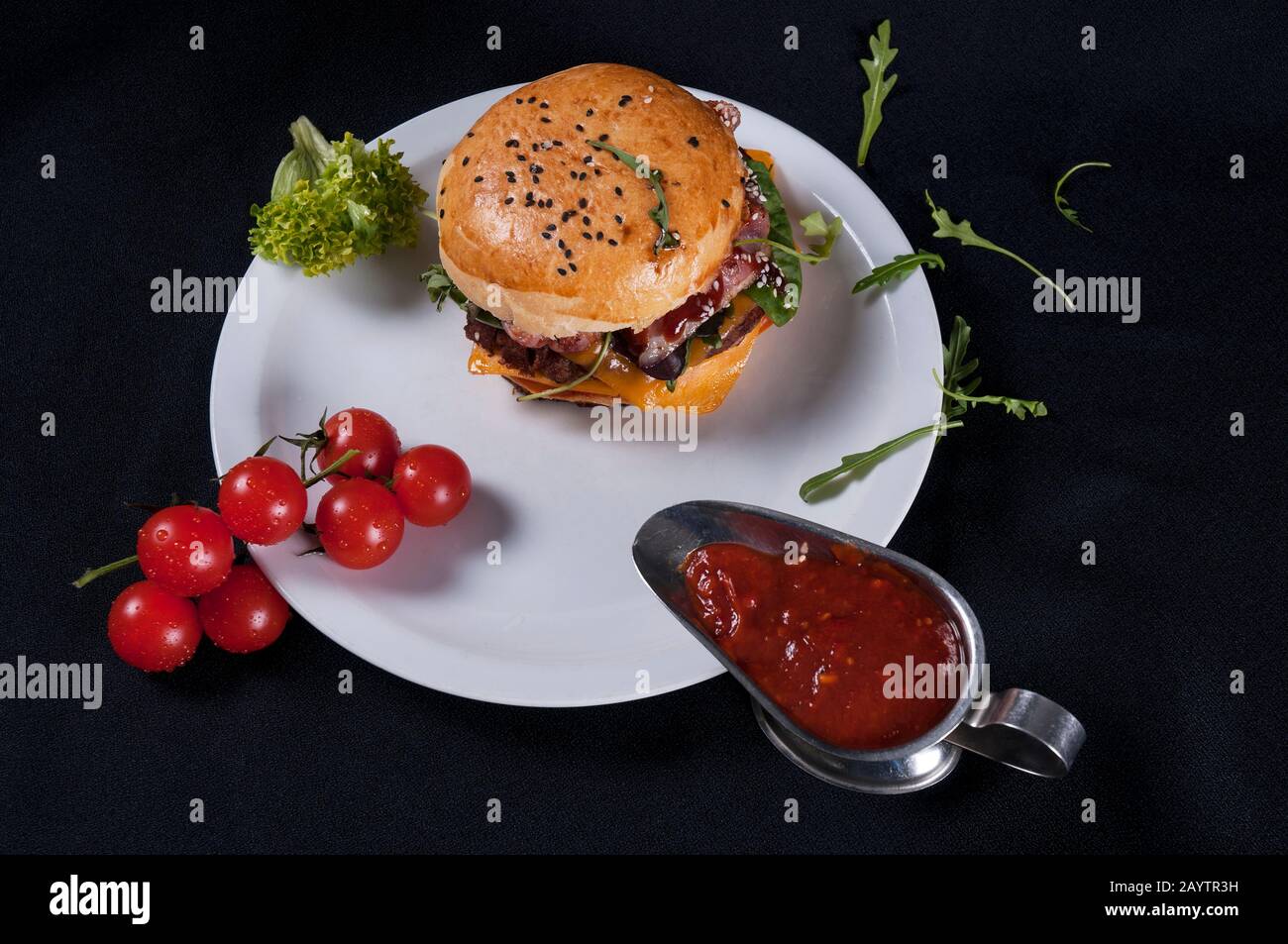 delicious burgers at the restaurant Stock Photo - Alamy