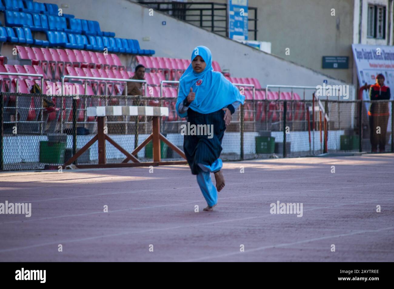 Woman athlete running 100 meter hi-res stock photography and images - Alamy