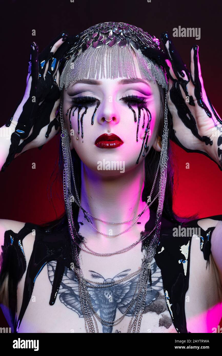 Colorful portrait of a young gothic woman crying with black blood Stock ...
