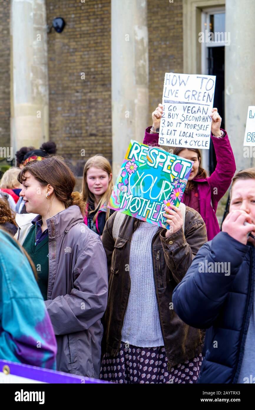 School children holding placards at a youth strike for climate change ...