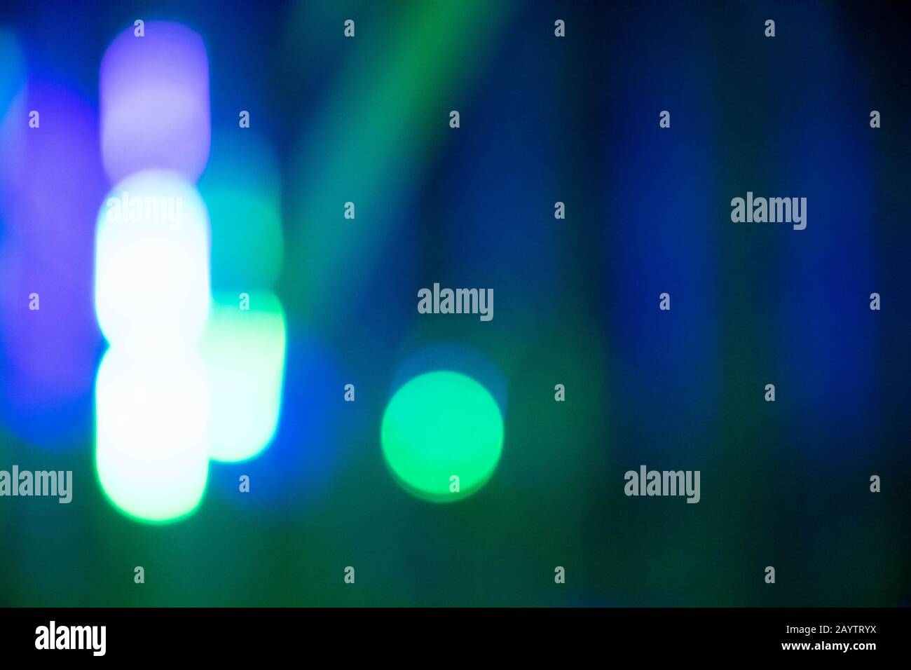 Abstract background with defocused bokeh colorful lights, glowing ...