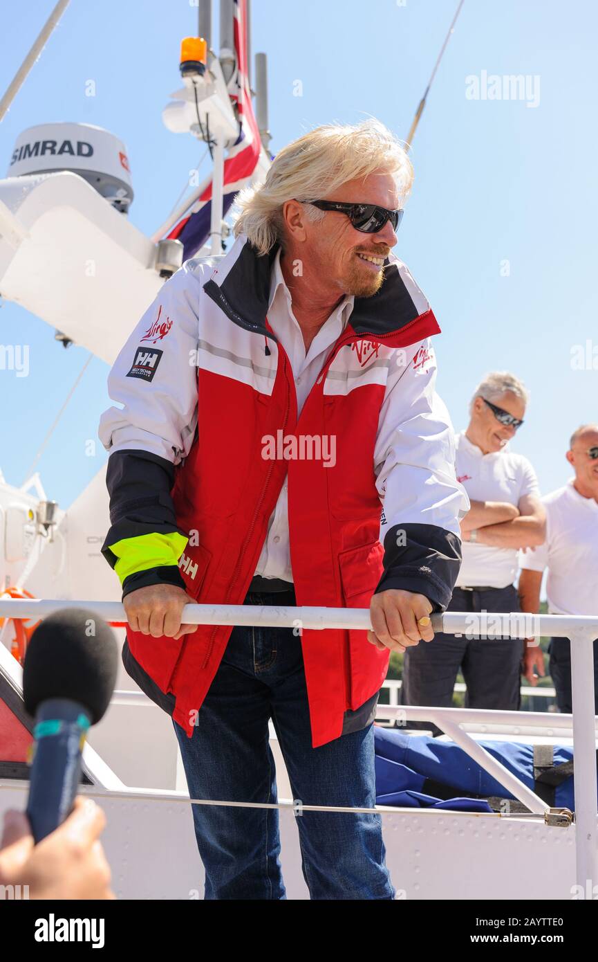 Sir Richard Branson with the original and new crew of the Virgin ...