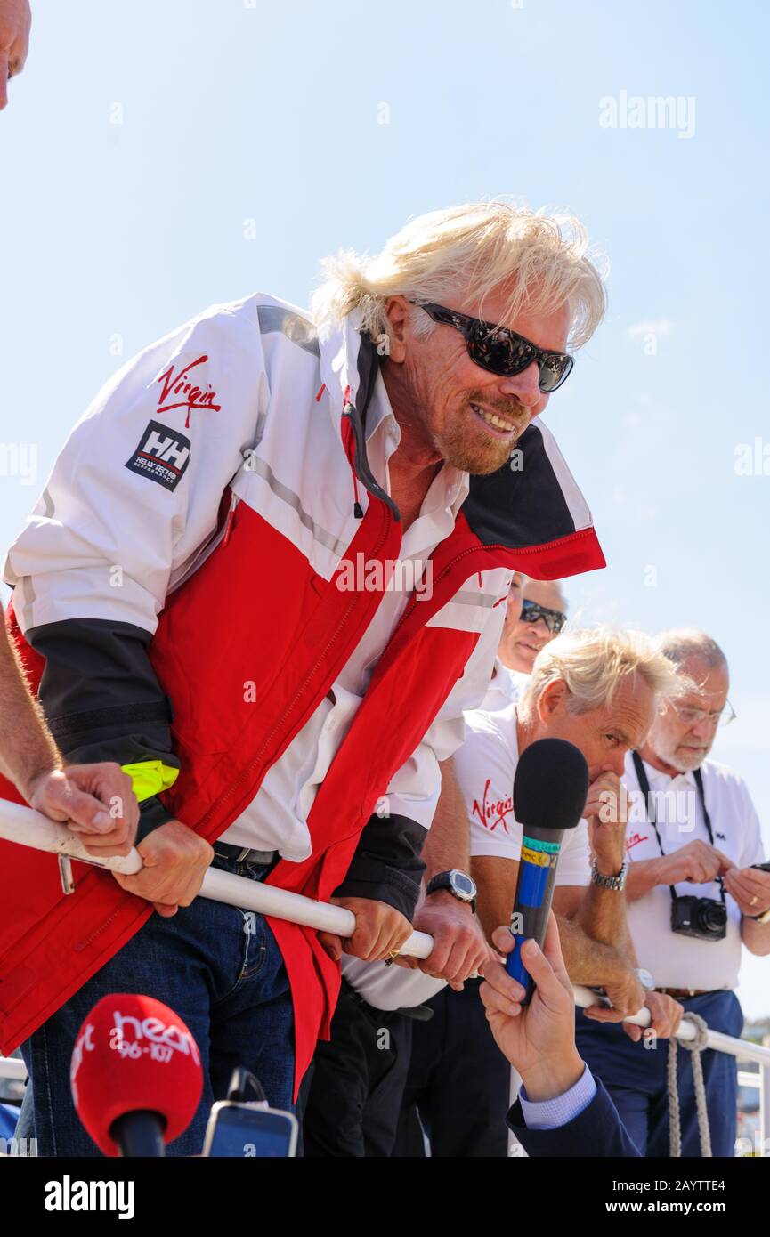 Sir Richard Branson with the original and new crew of the Virgin ...