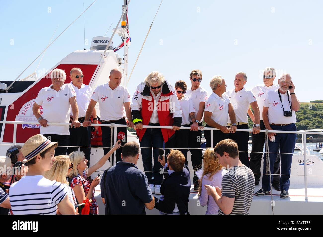 Sir Richard Branson with the original and new crew of the Virgin ...