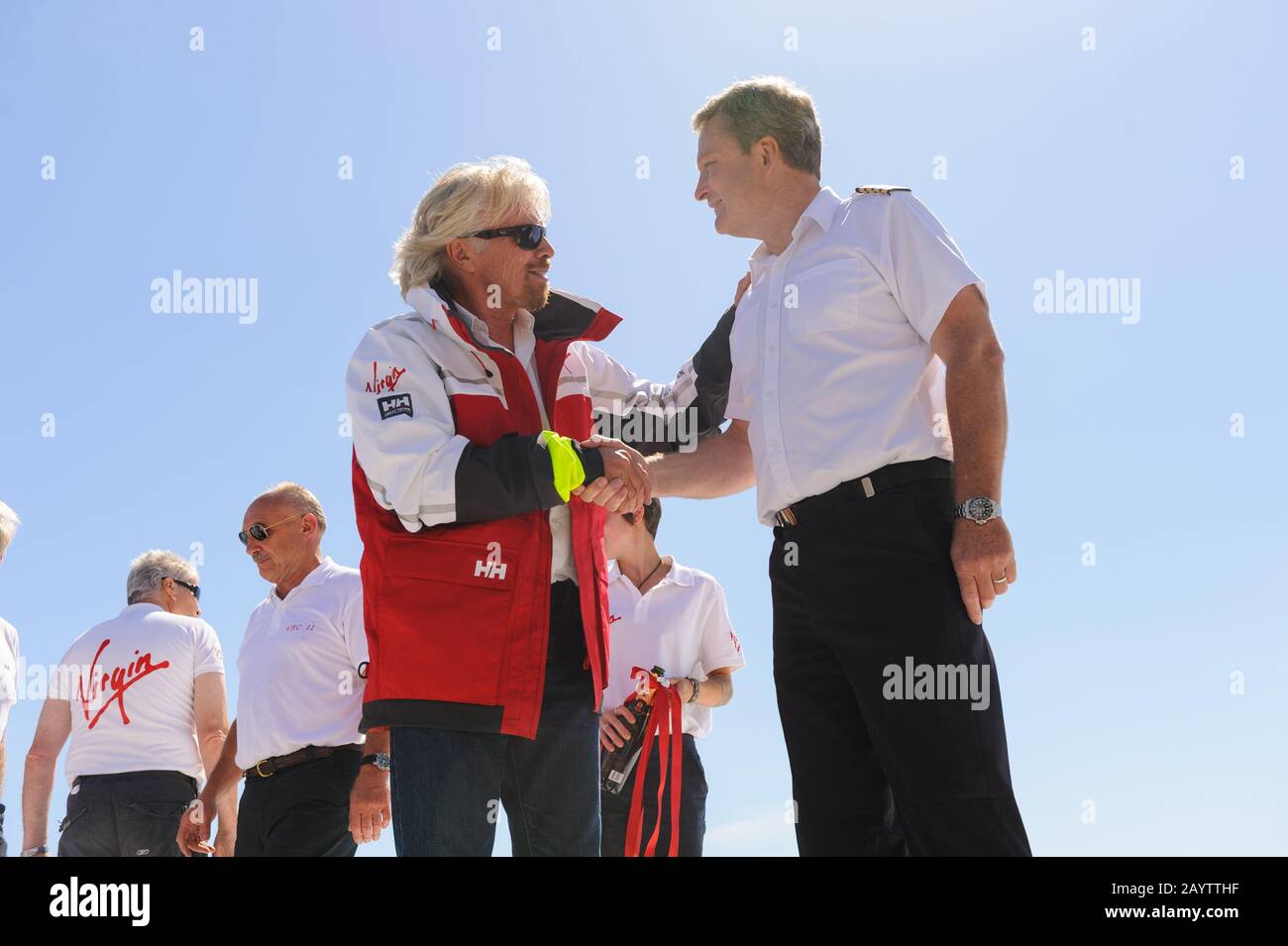 Sir Richard Branson with the original and new crew of the Virgin ...