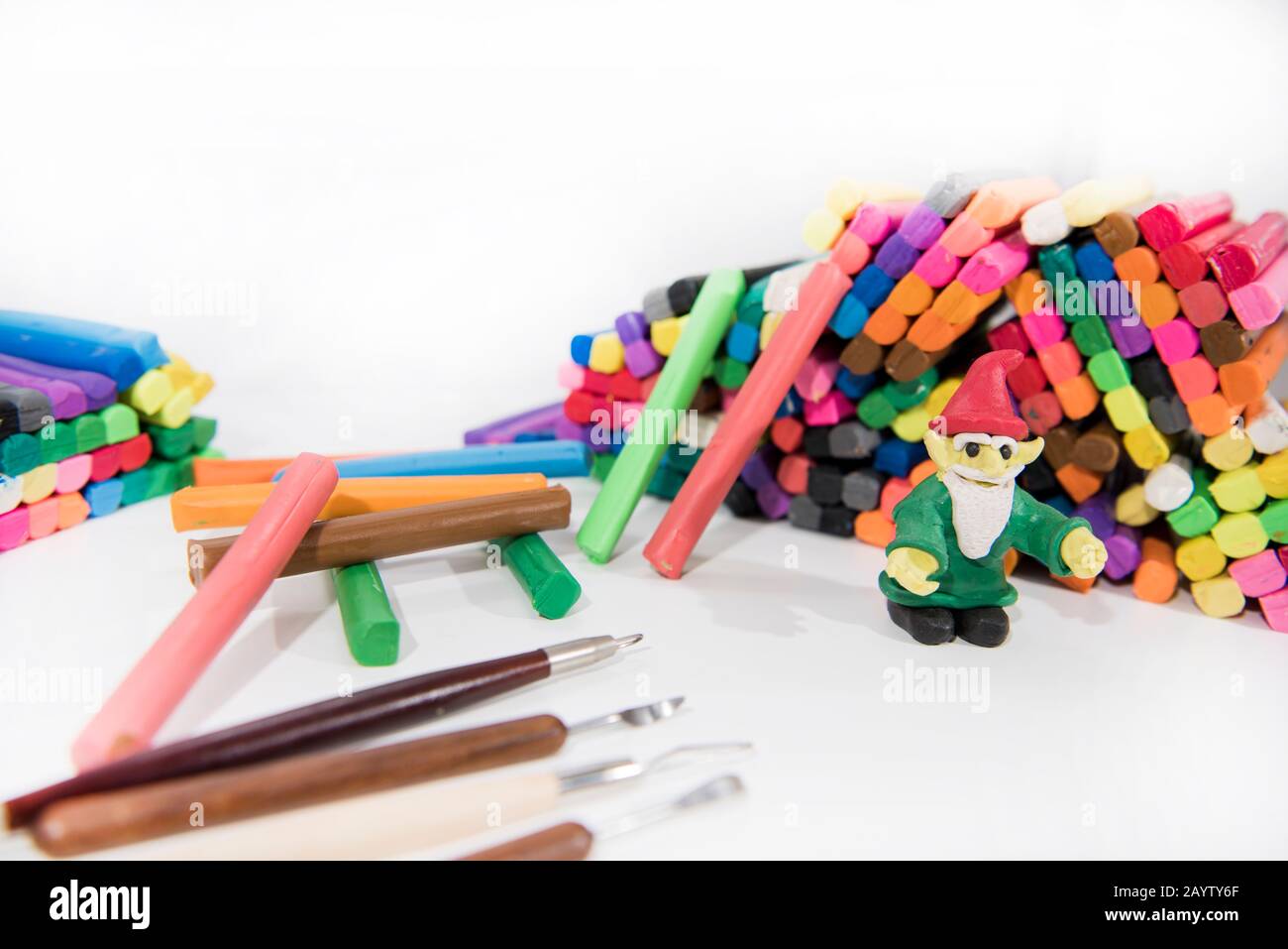 Child modelling with plasticine face hi-res stock photography and ...