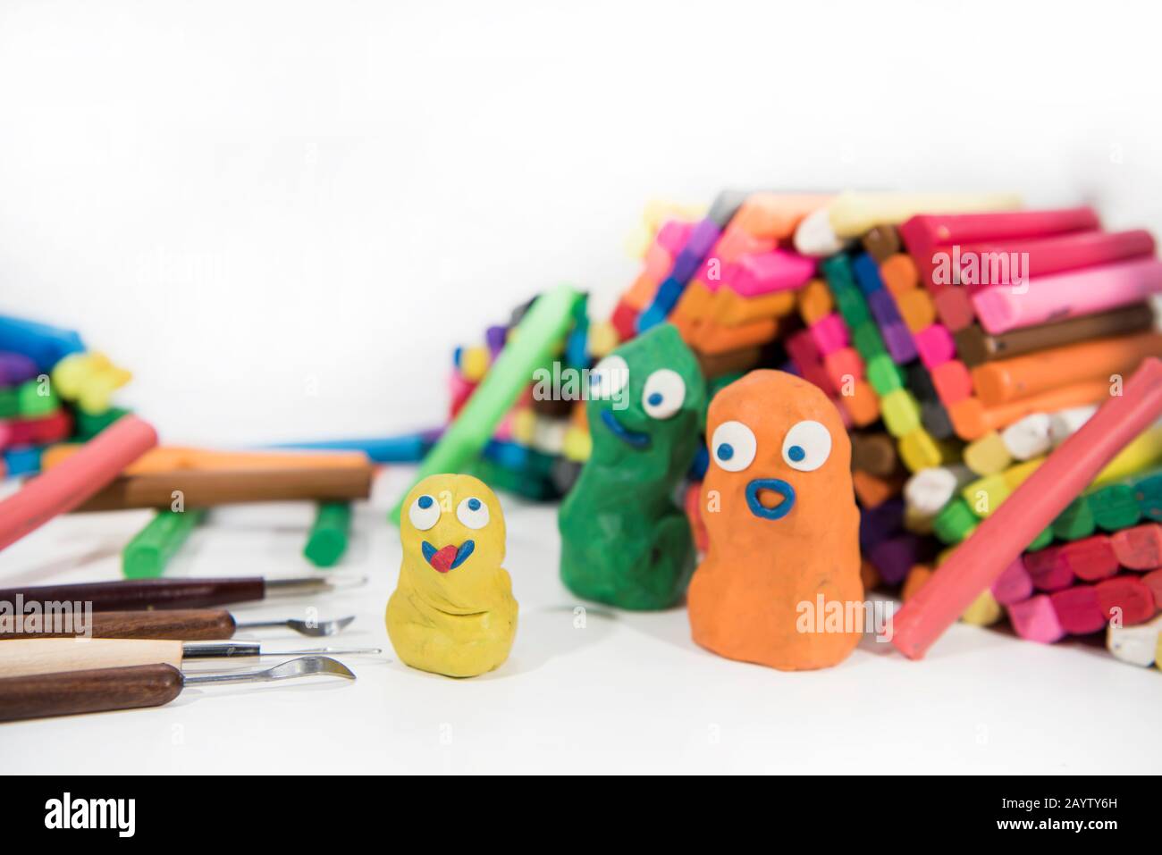 Child modelling with plasticine face hi-res stock photography and ...