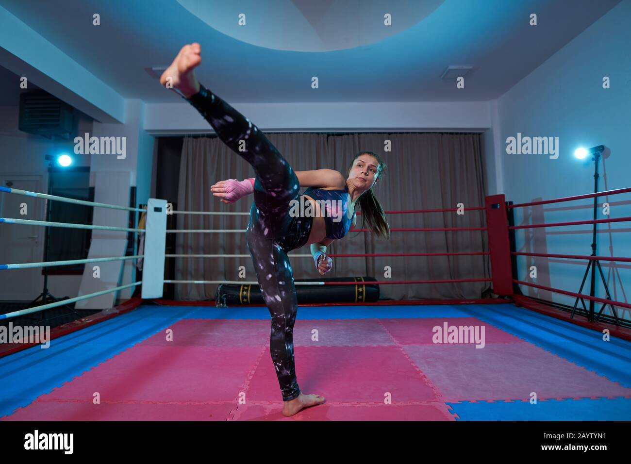 Kickboxer girl shadow boxing in the ring before sparring Stock Photo ...