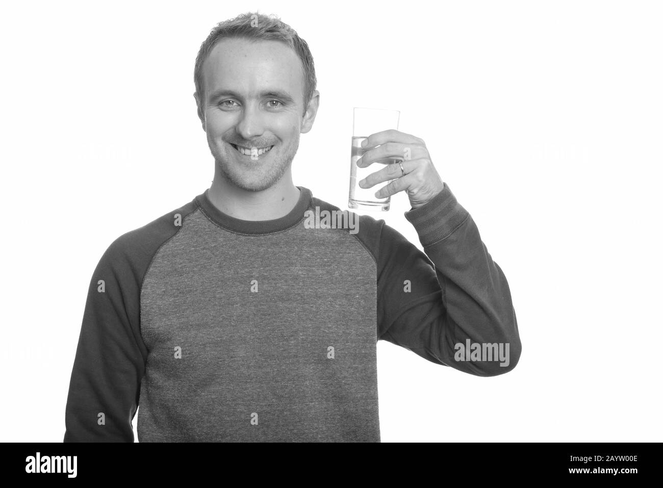 Portrait of happy handsome man drinking water Stock Photo - Alamy Portrait of happy handsome man drinking water Stock Photo - Alamy