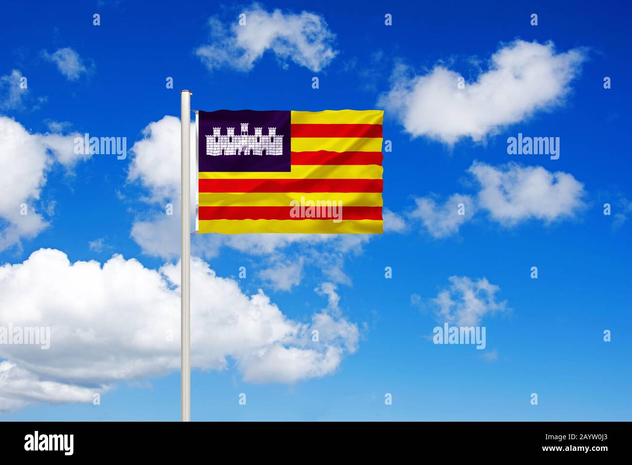 flag of Balearic islands in front of blue cloudy sky, Spain, Balearic ...
