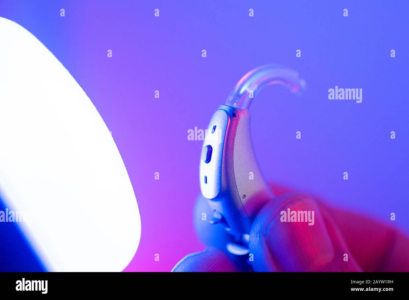 Modern digital hearing aid for deafness and deaf people Stock Photo - Alamy