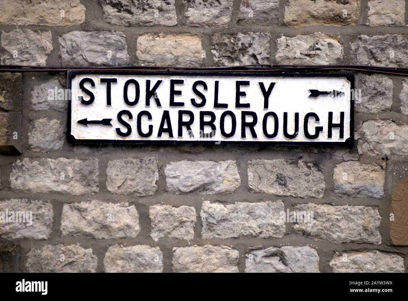 Stokesley and Scarborough road sign, Helmsley, North Yorkshire Stock ...