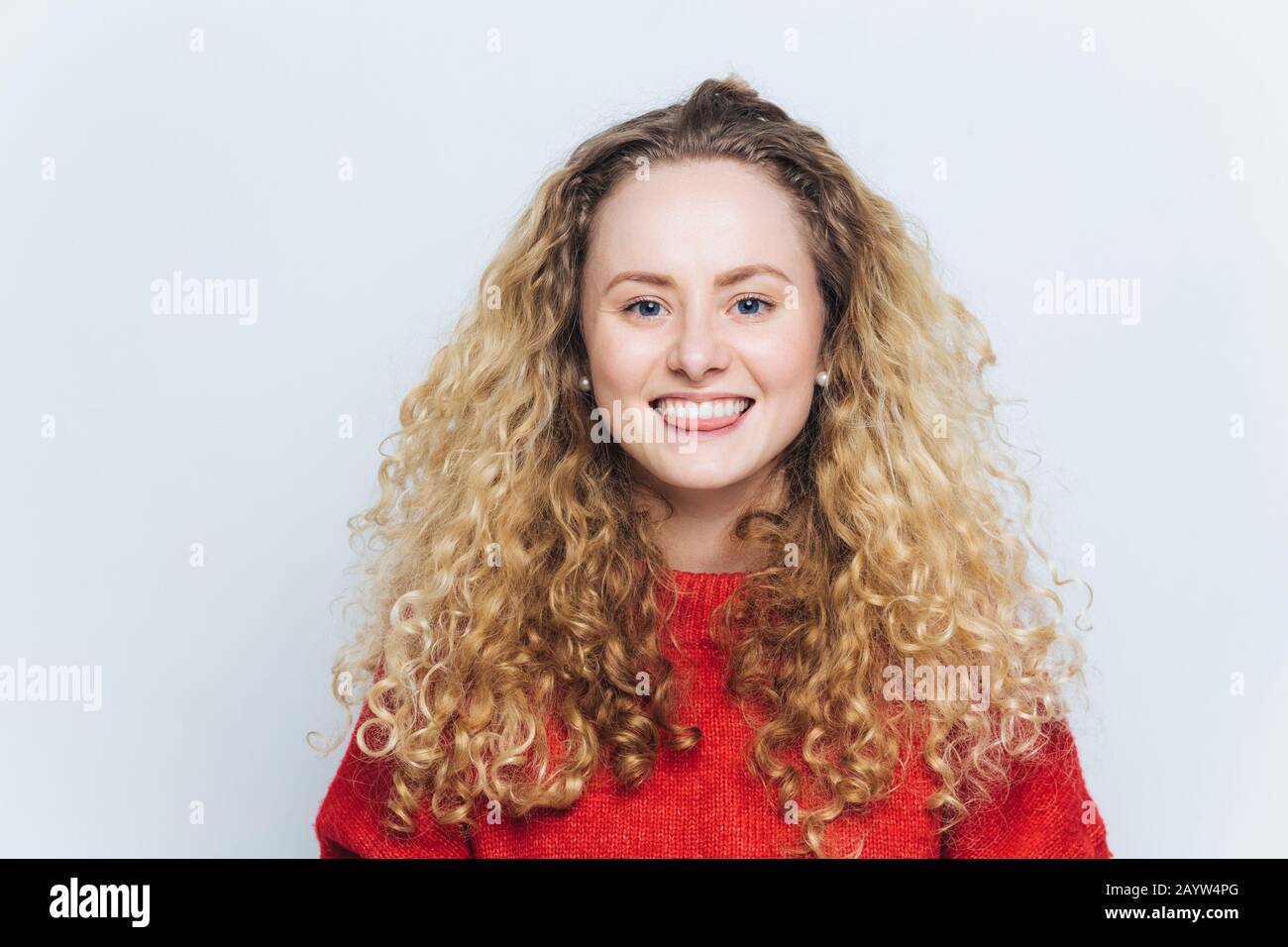 Cheerful blonde model red lips hi-res stock photography and images - Alamy