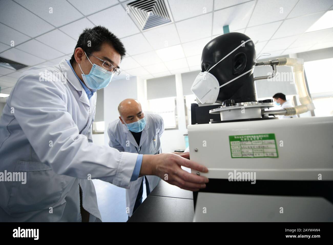 (200217) -- XI'AN, Feb. 17, 2020 (Xinhua) -- Inspectors test the ...